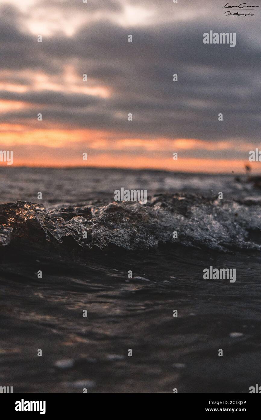 Vertical closeup shot of a tide flow Stock Photo - Alamy