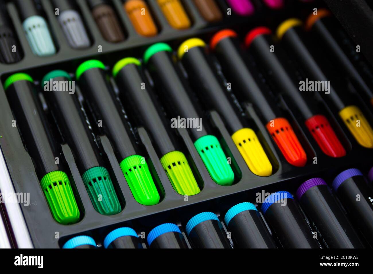 big set of bright multicolored colorful felt-tip pens for drawing in a ...