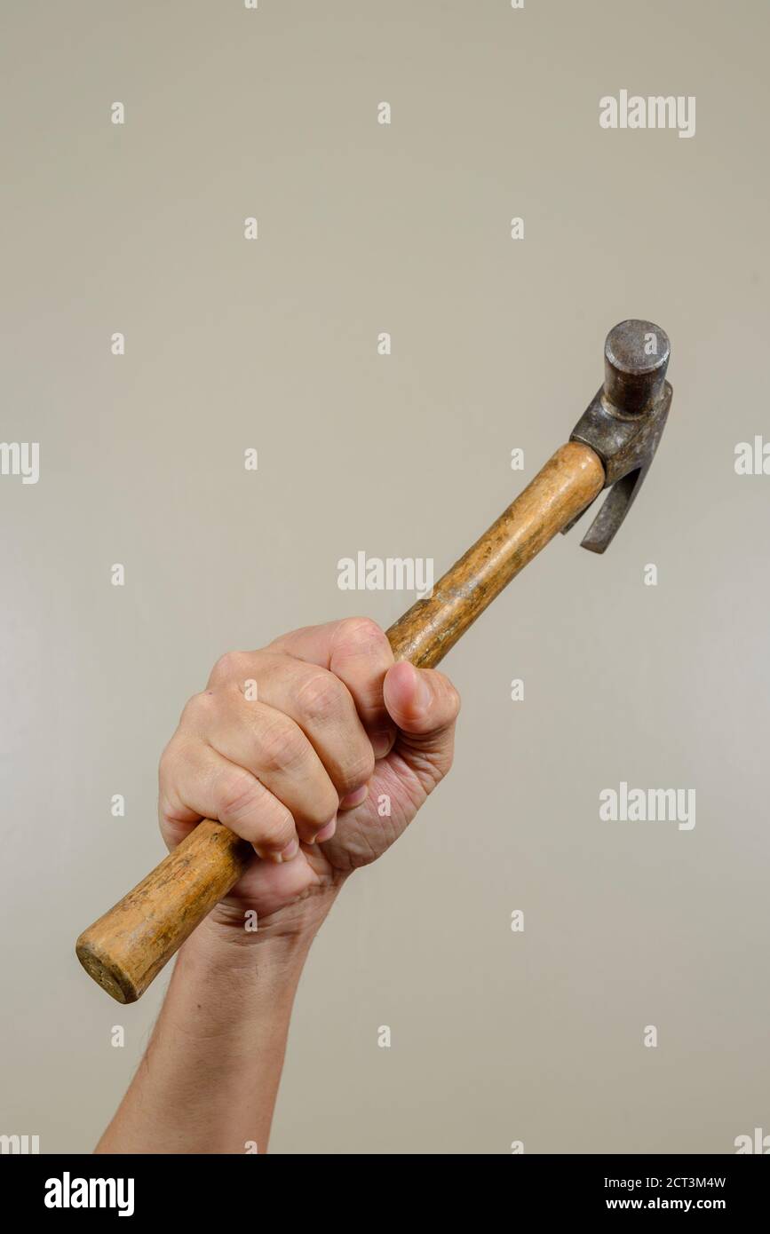 industry worker hand holding mechanical tool Stock Photo - Alamy