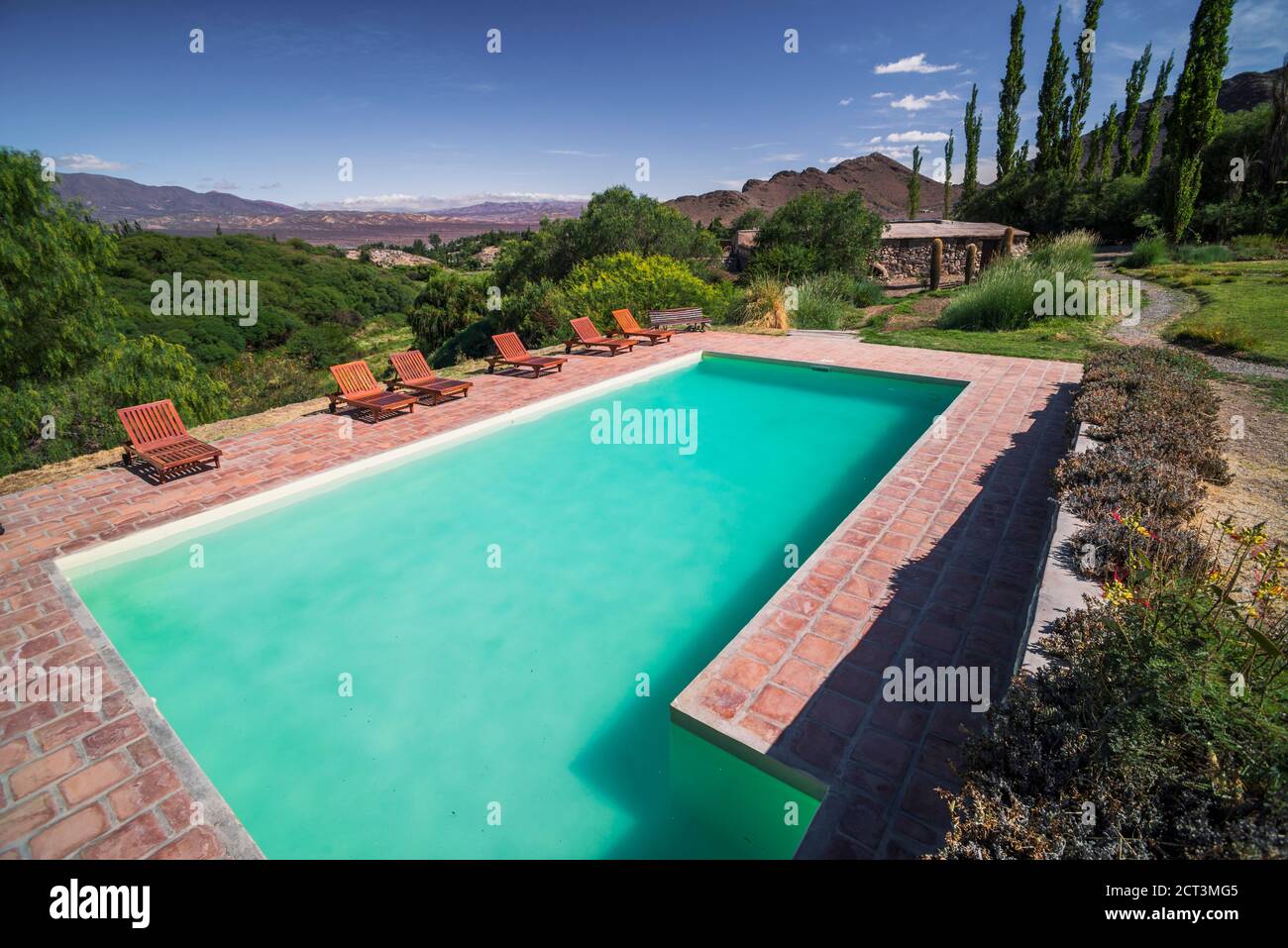 Outdoor swimming pool with amazing view of Andes Mountains and ...