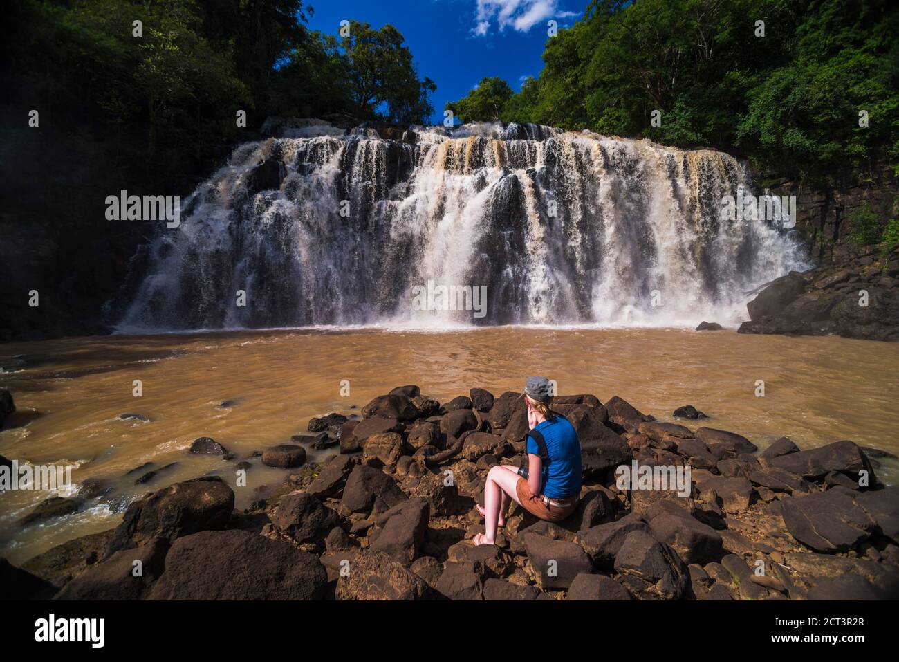 People at Waterfall connecting a tributary with the Rio Parana (Parana ...