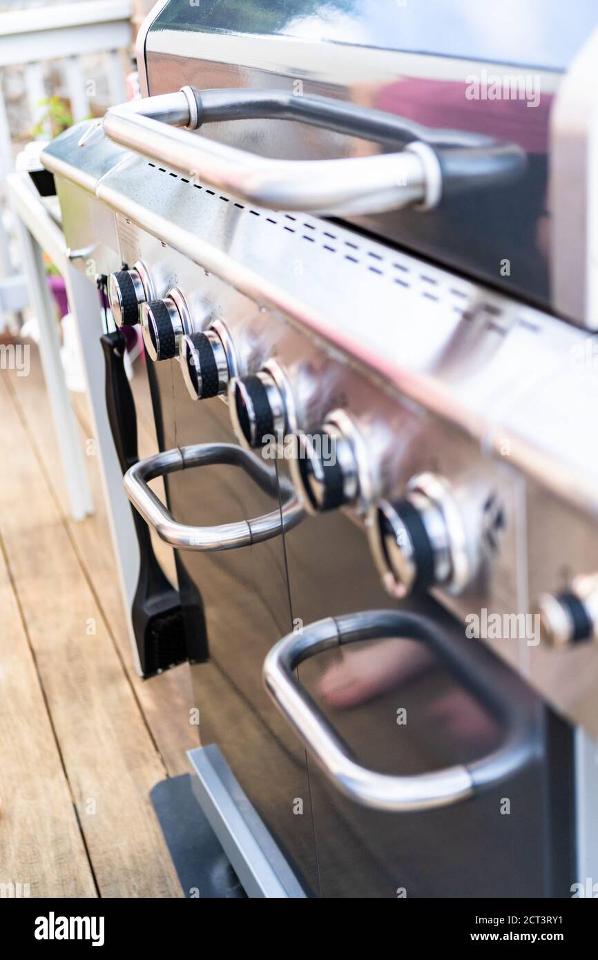 Close up of control knobs on an outdoor gas grill Stock Photo - Alamy