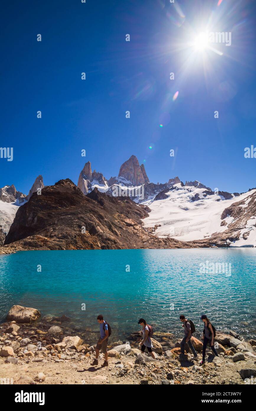Hikers hiking at Lago de los Tres, Mount Fitz Roy behind, El Chalten ...