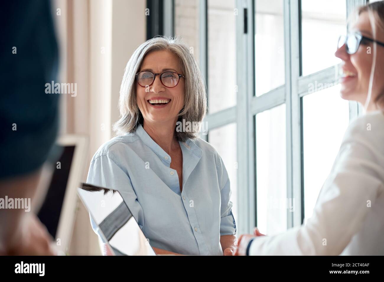 Group laugh meeting project hi-res stock photography and images - Alamy