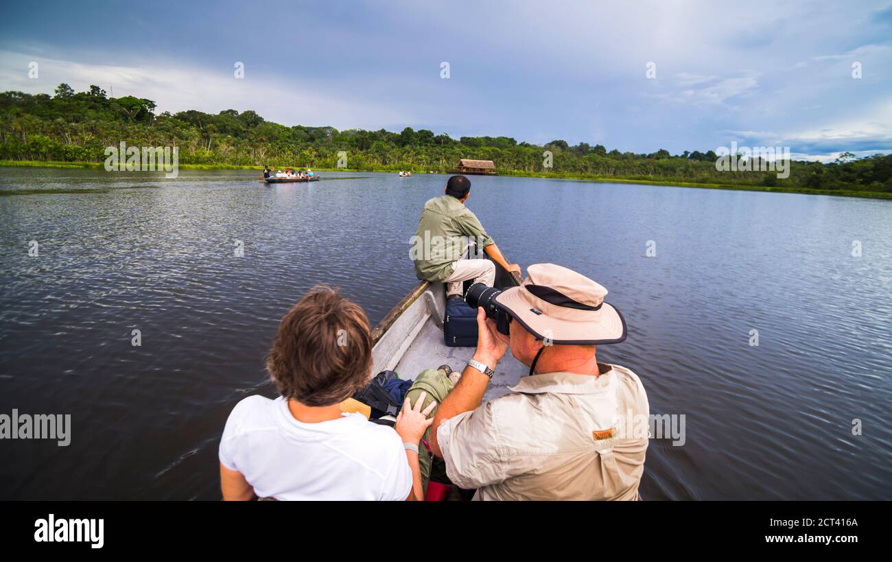 Arriving to Sacha Lodge by dugout canoe in the Amazon Rainforest, Coca ...