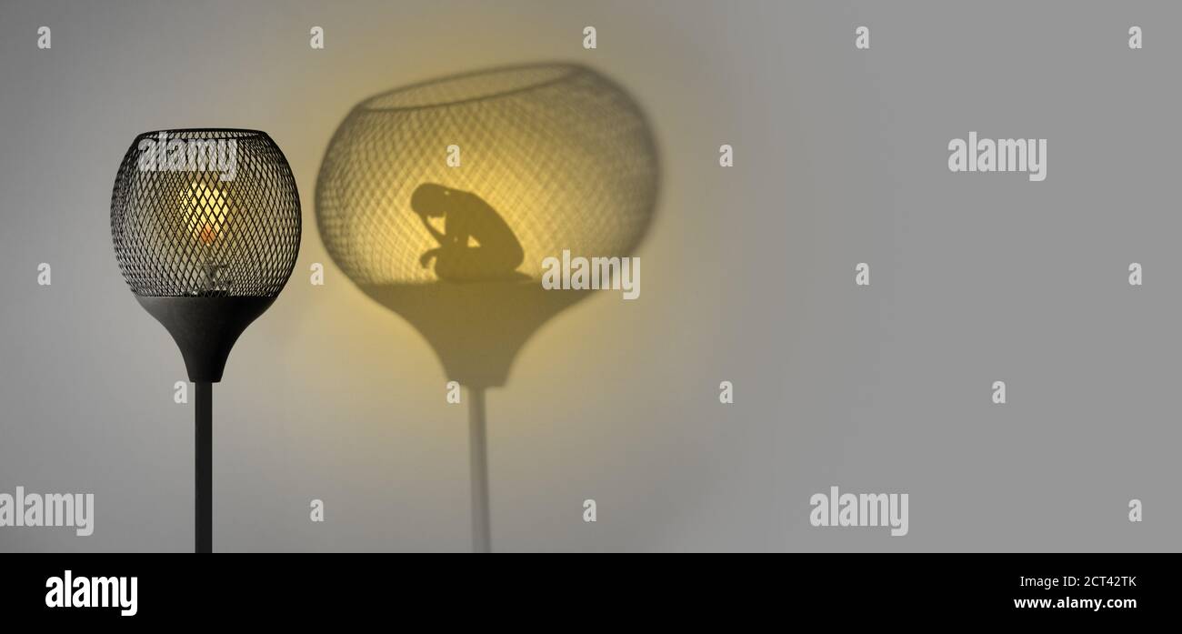 Gaslight with silhouette of woman in shadow cast by the lamp ...