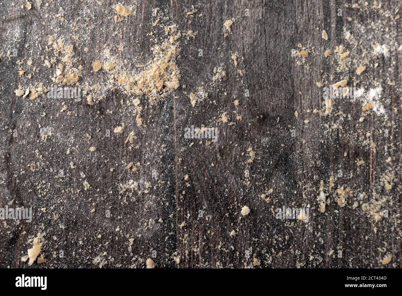 Bread crumbs and pastry flour on the wooden table use for background ...