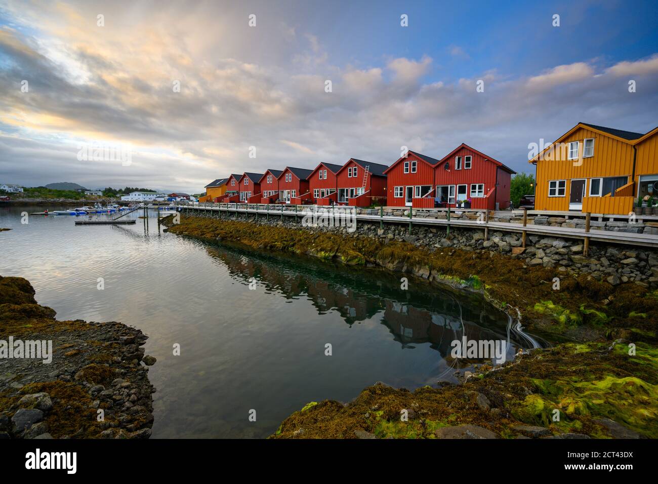 Beautiful waterfront house reflecting the water Evening and twilight ...
