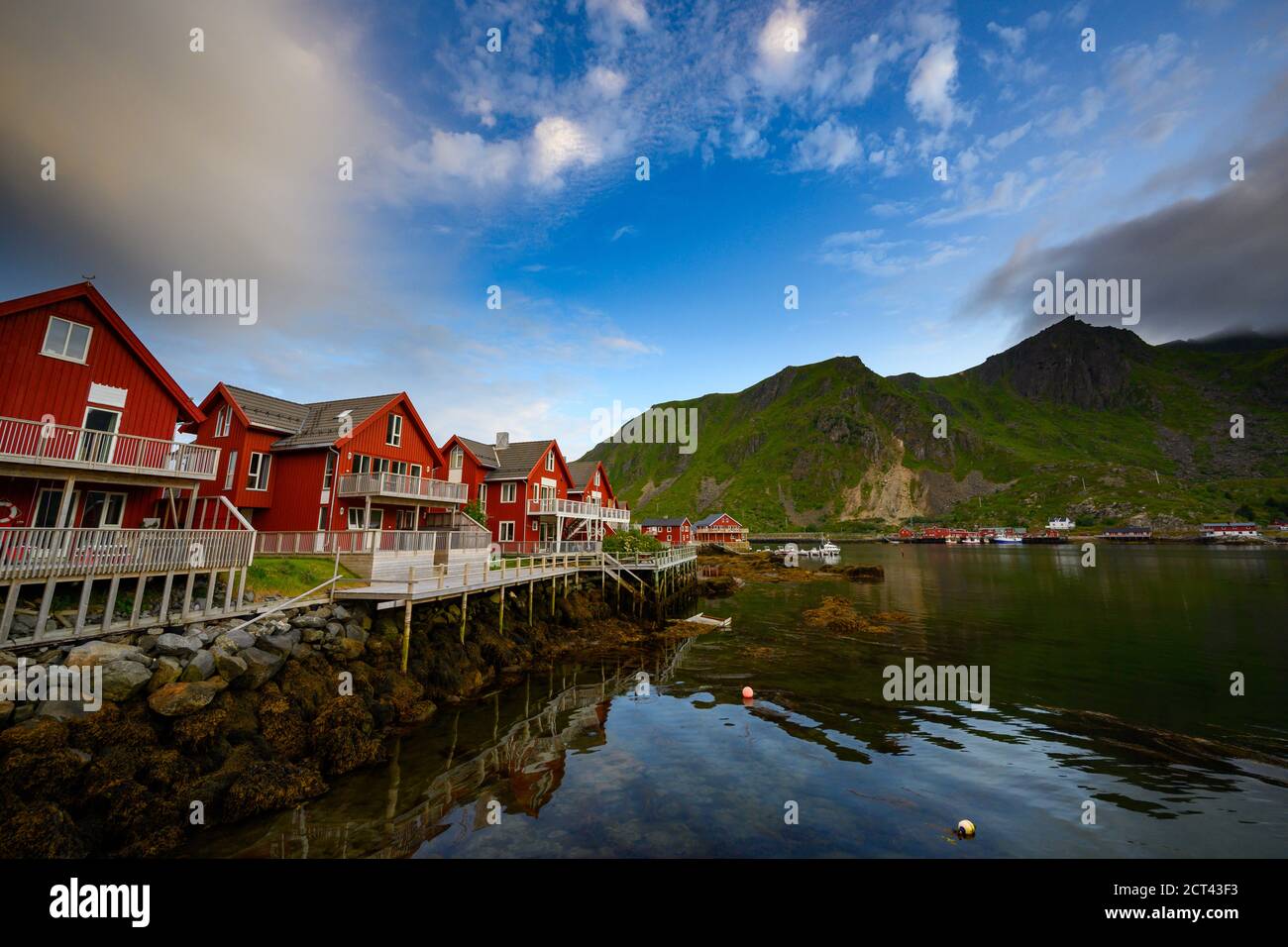 Beautiful waterfront house reflecting the water Evening and twilight ...