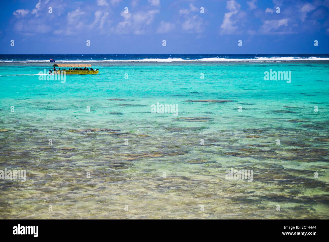 Tourist boat trip on a summer vacation to the tropical island of ...