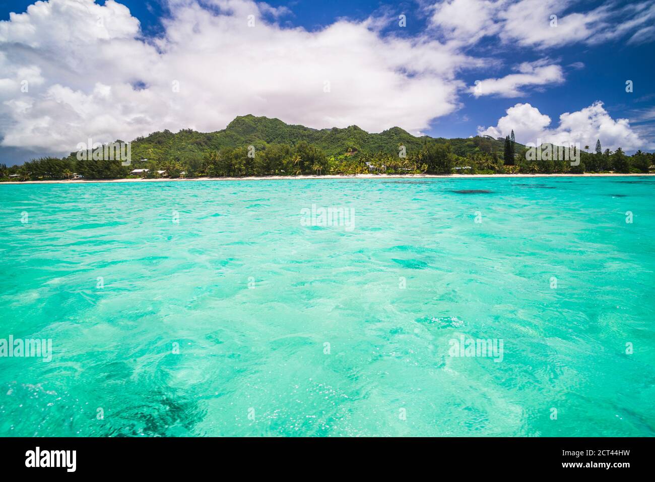 Tropical Island of Rarotonga seen from the beautiful crystal clear ...