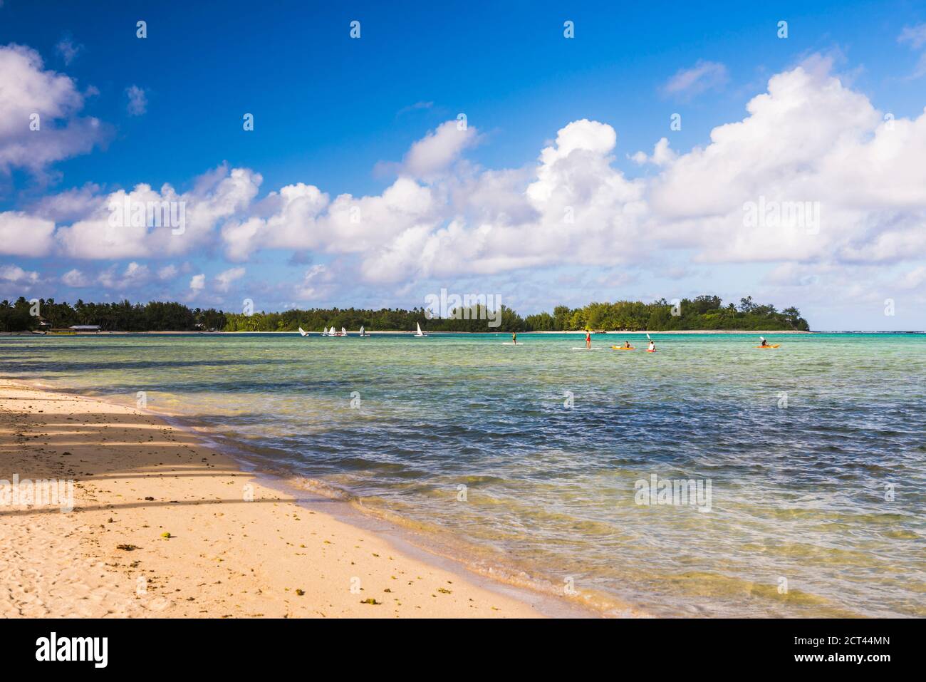 Paddleboarding and kayaking in Rarotonga, Cook Islands Stock Photo - Alamy