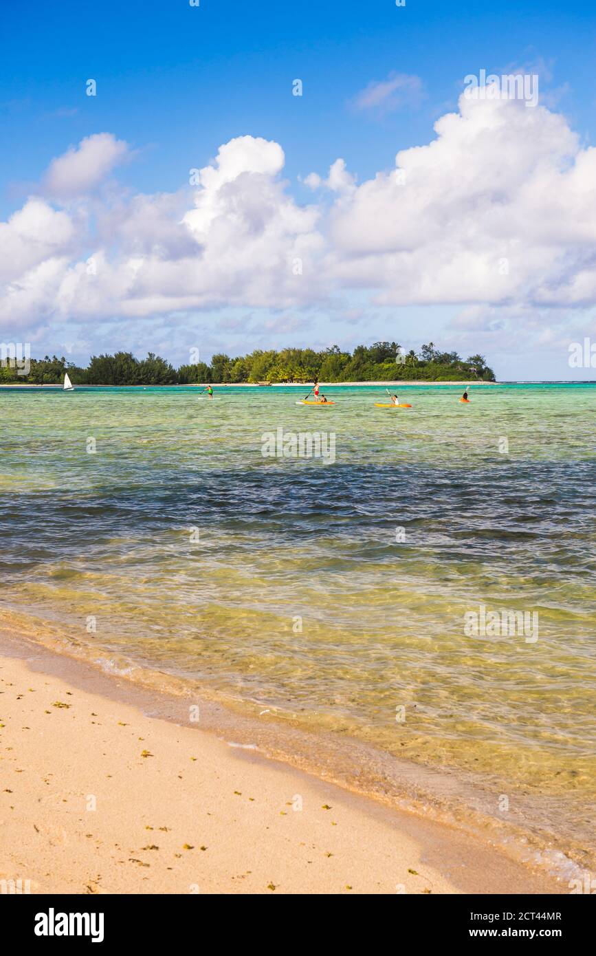 Paddleboarding and kayaking in Rarotonga, Cook Islands, background with ...