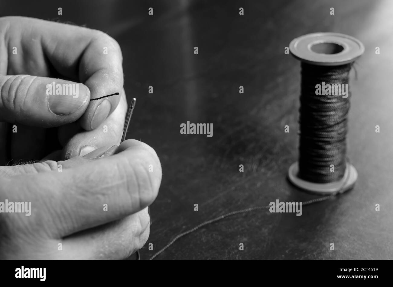 Hand inserts Black and White Stock Photos & Images - Alamy