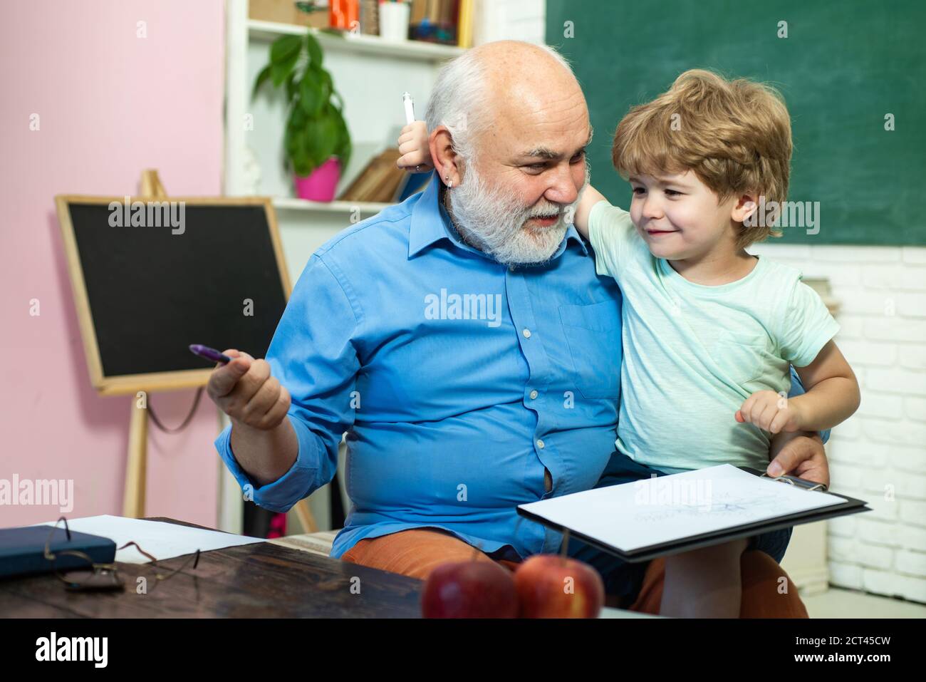 Elementary school and education. Concept of a retirement age. Father ...