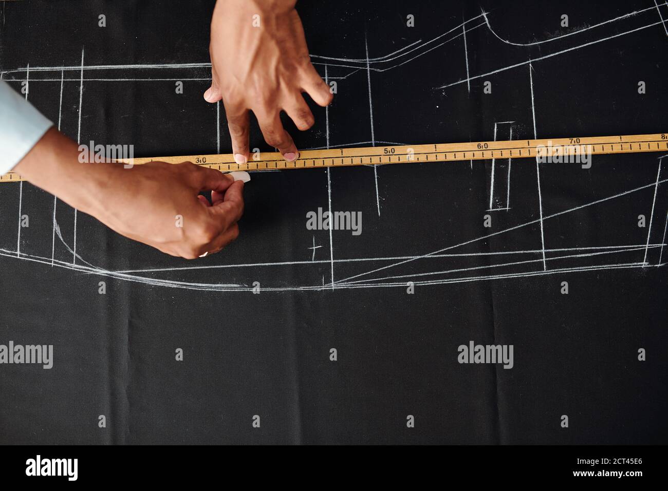 Tailor drawing detail of jacket Stock Photo - Alamy