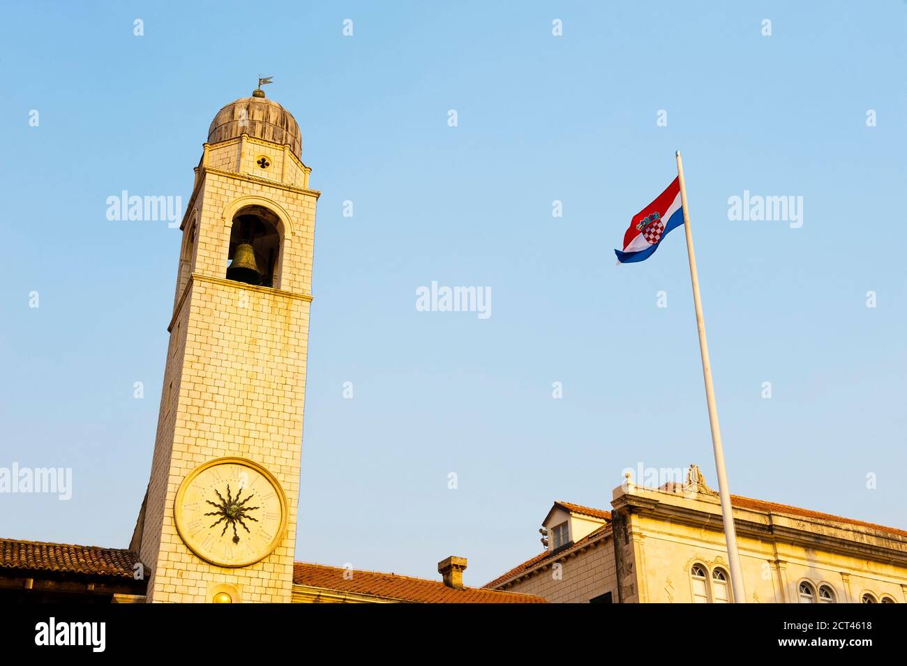 Photo of Dubrovnik City Bell Tower and the Croatian flag, Dubrovnik ...