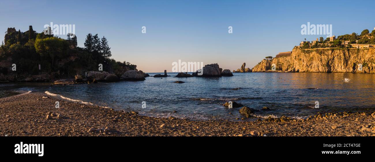 Taormina, panoramic photo of Isola Bella Beach in the first morning ...