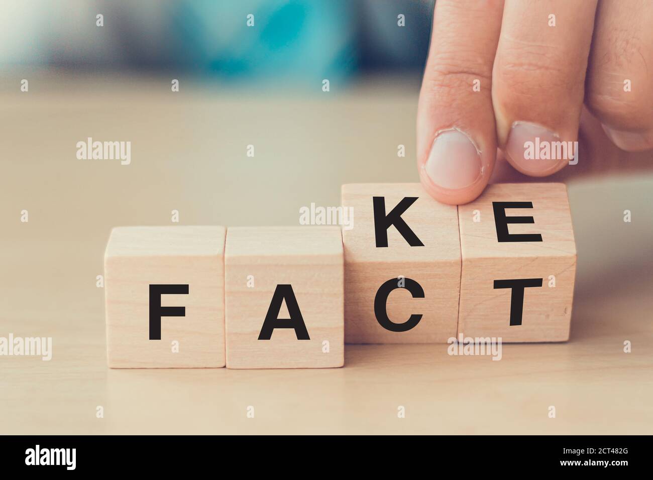 hand man flip or arranging wooden cube block which change the word from ...