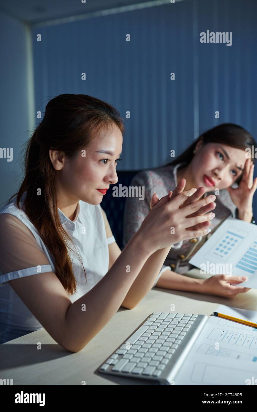 Tired project managers finishing project Stock Photo - Alamy
