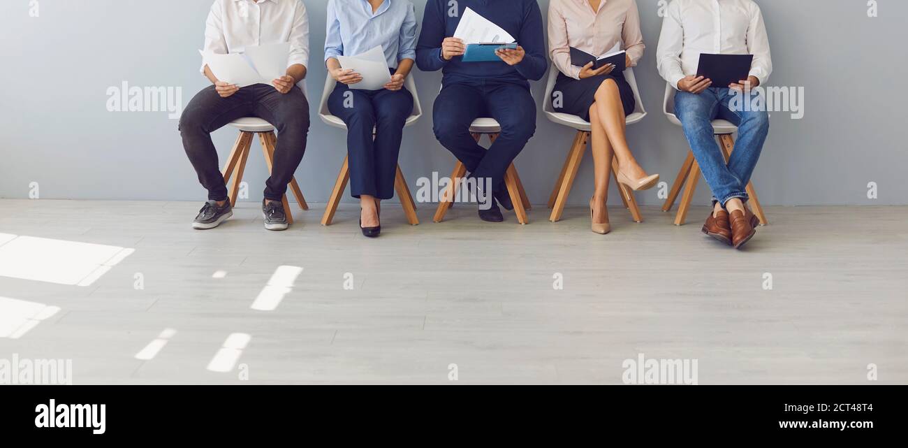 Group of people waiting in line for job interview or office workers ...