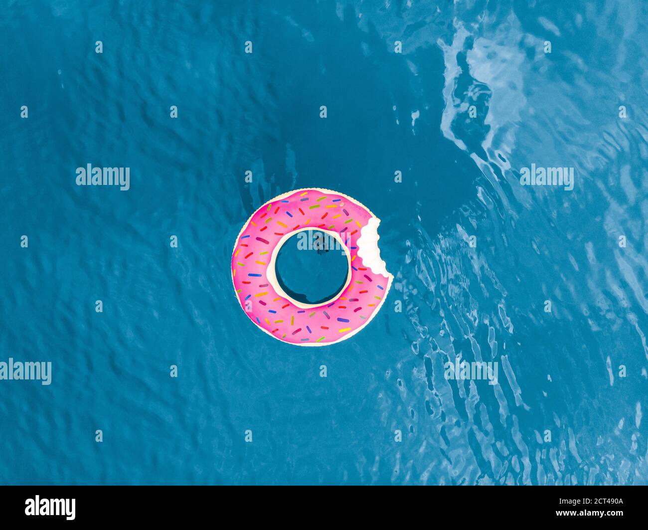 Inflatable donut water hi-res stock photography and images - Alamy