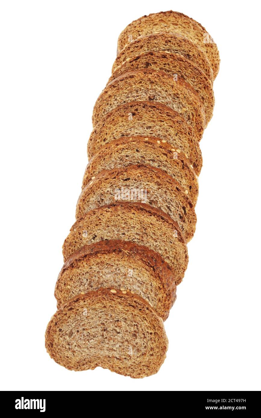 Slices of whole-wheat dry rusk bread isolated on white Stock Photo - Alamy