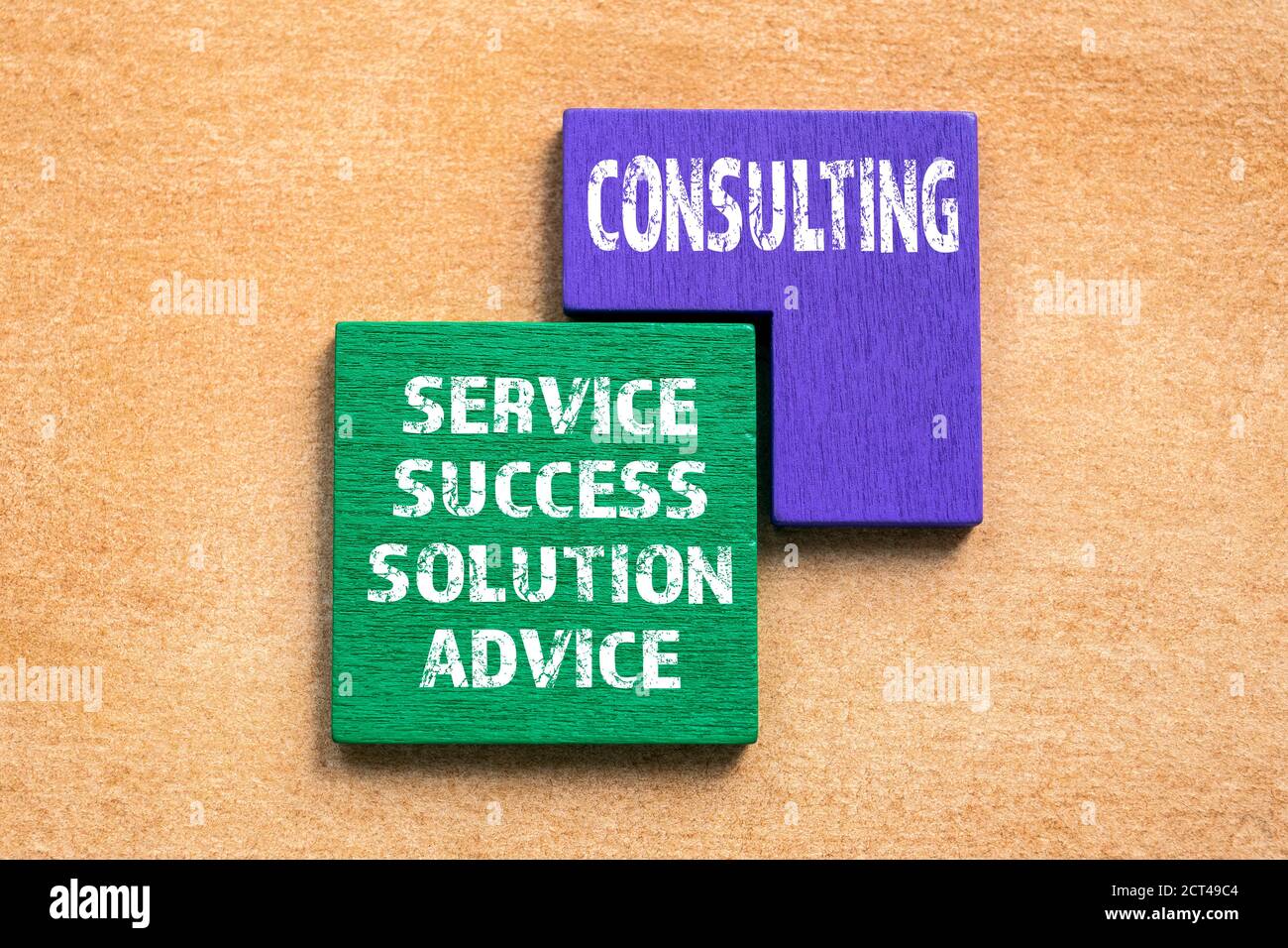 CONSULTING concept. Colored wooden blocks, puzzle and mind game. Orange ...