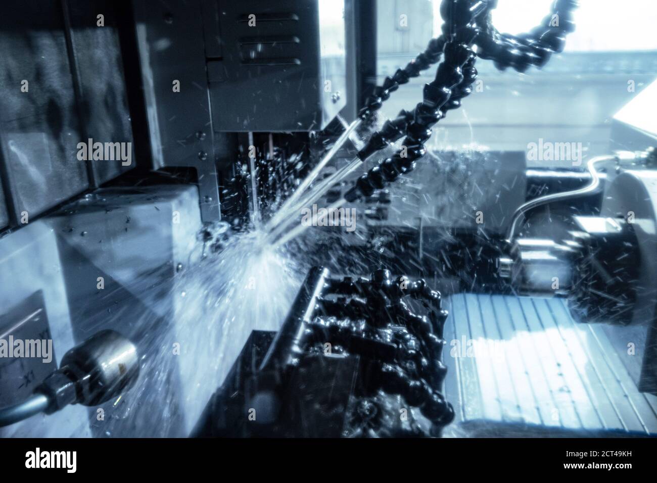 Cnc milling machine cutting oil coolant hi-res stock photography and ...