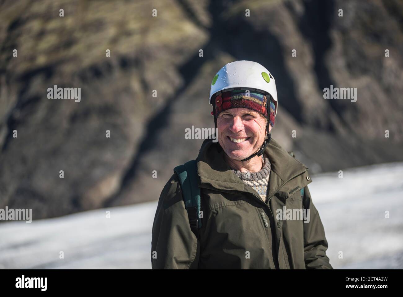 Portrait of a happy old man on vacation on an adventure holiday on ...