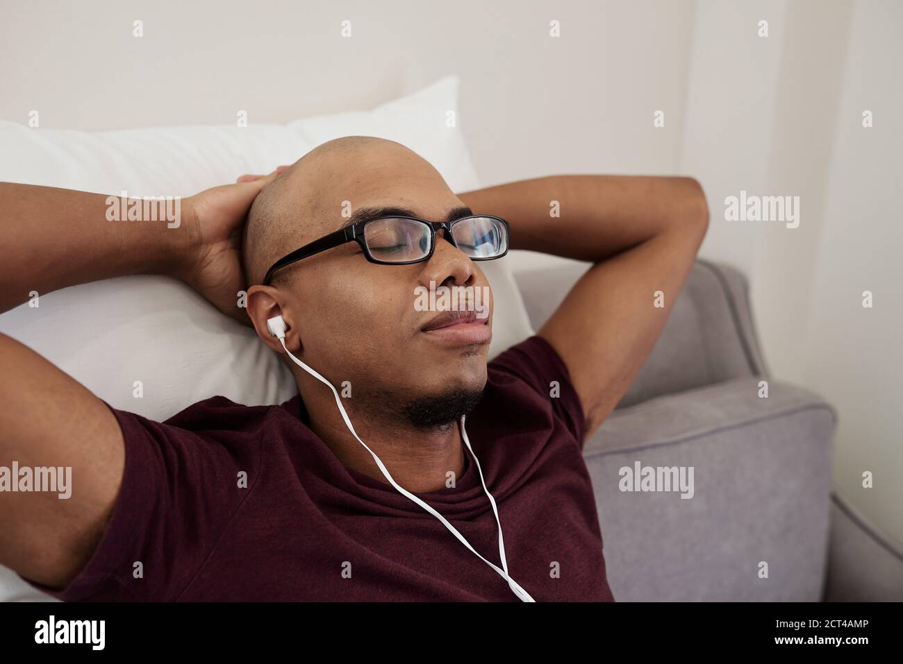 Portrait young men enjoying music hi-res stock photography and images ...