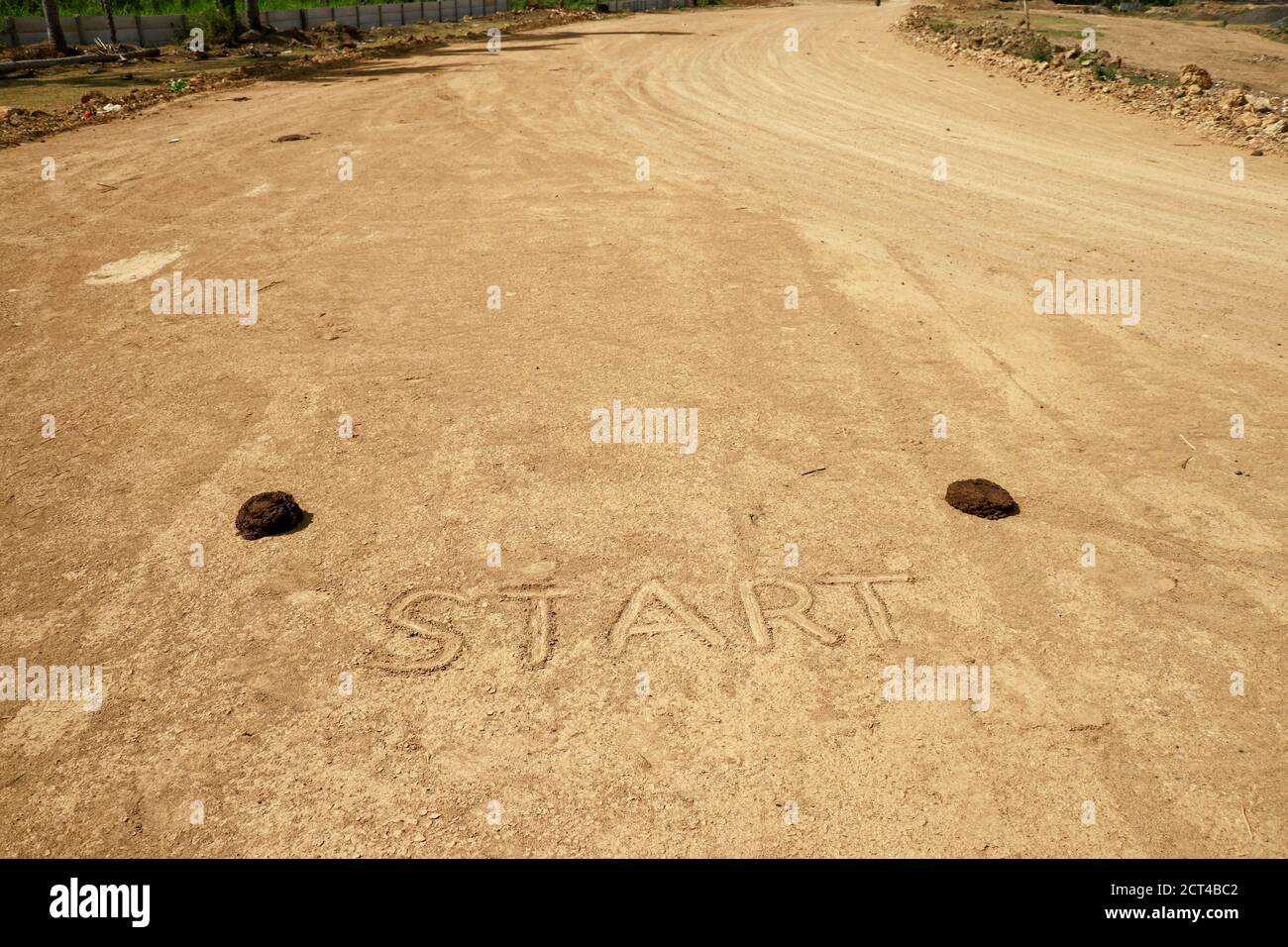 Sunny start line racing background on sand. Sign start on the race ...