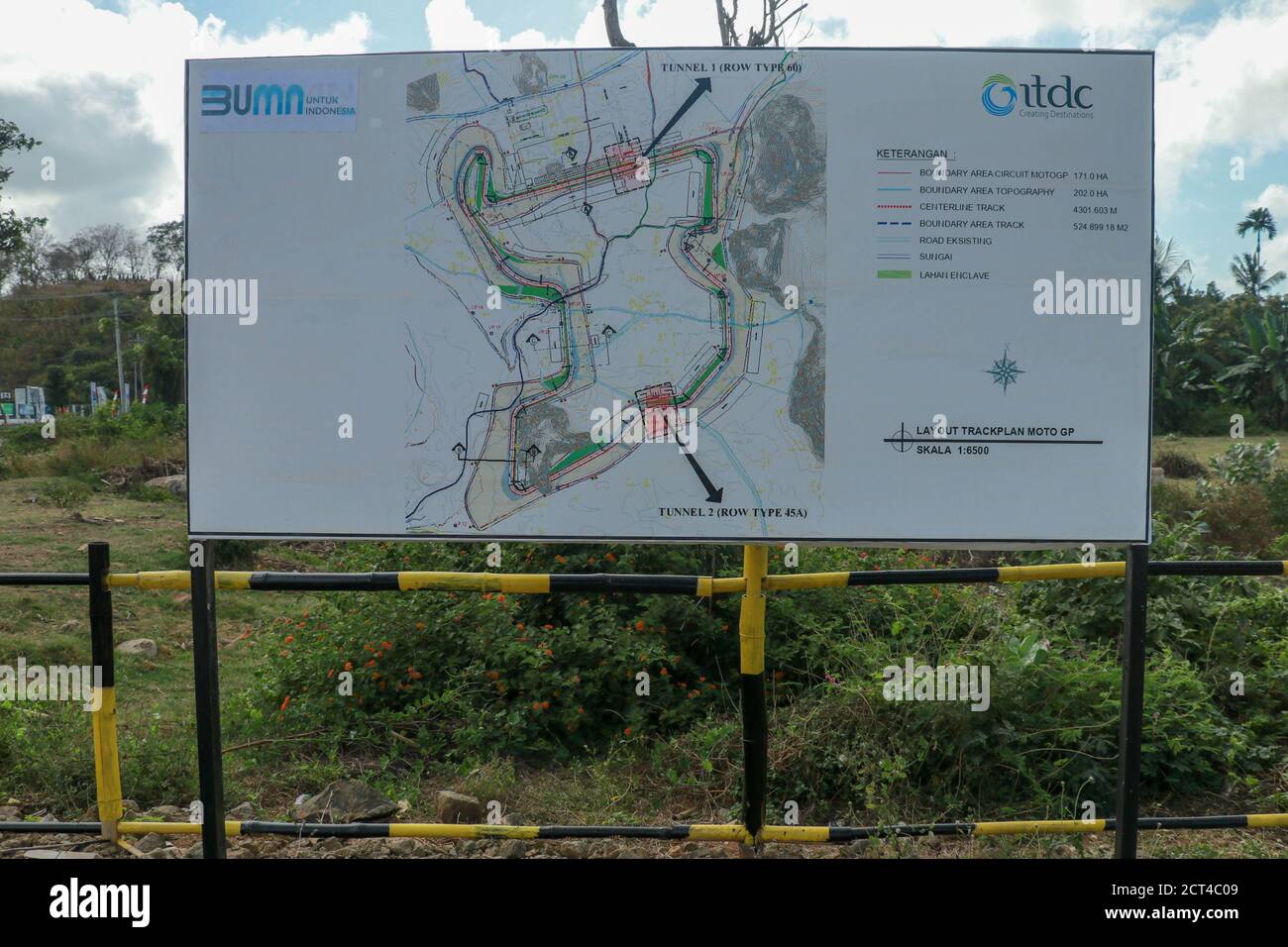 Banners with a plan of the area and the racing circuit. Construction of ...