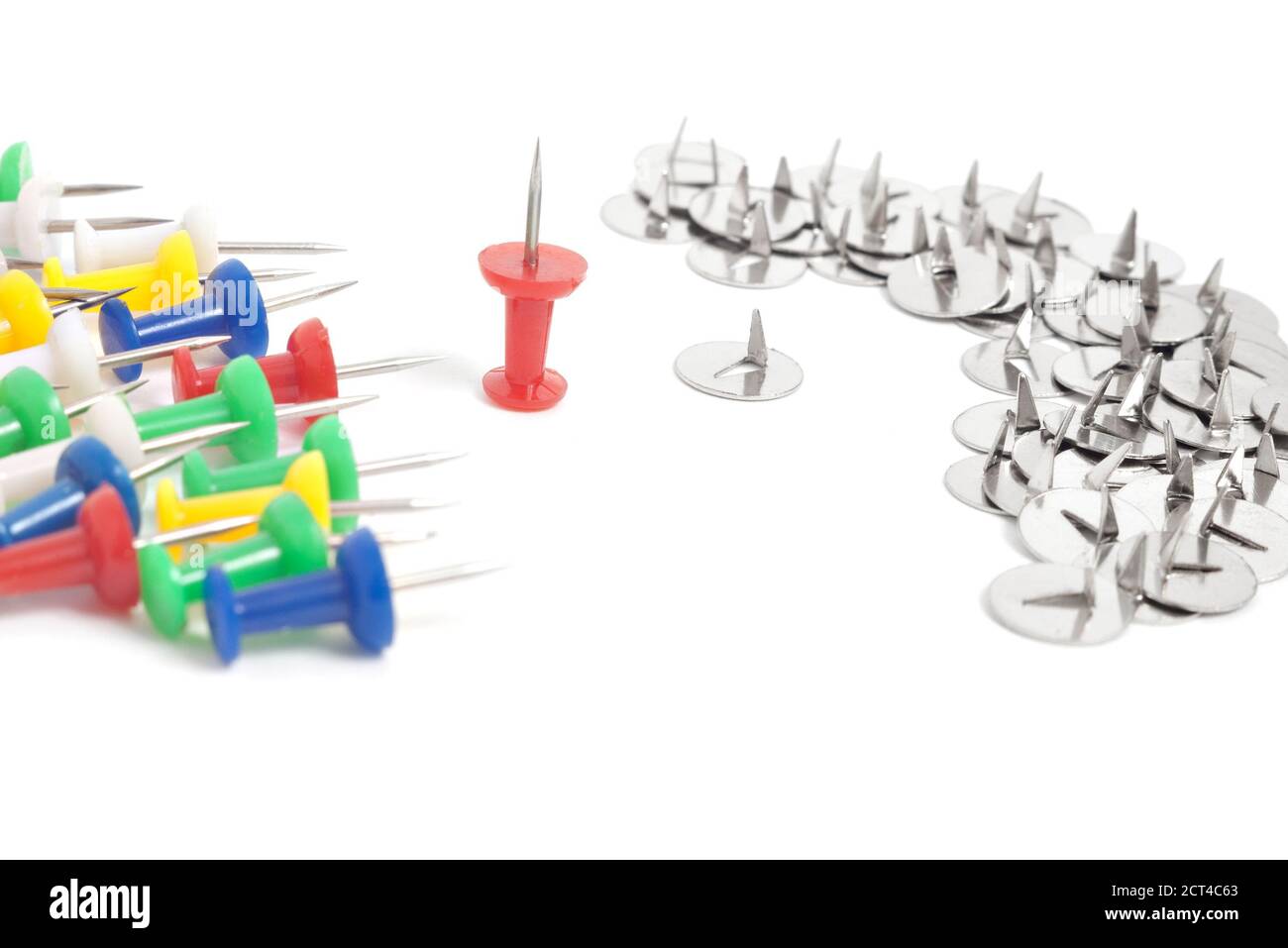 Bunch of colored drawing pins and metal thumbtacks turned upside down ...