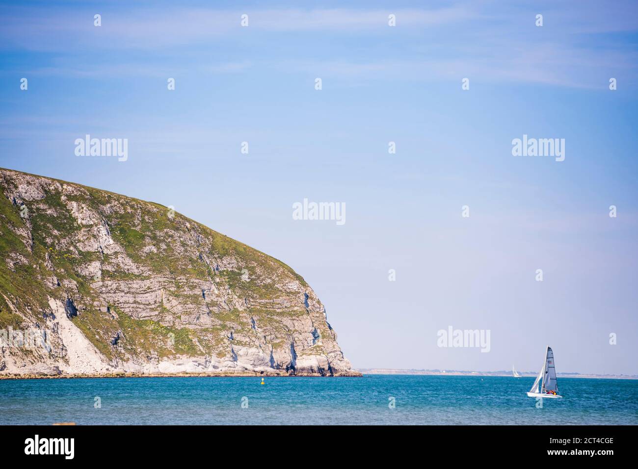 Sailing under the white cliffs at Swanage Beach, Dorset, Jurassic Coast ...