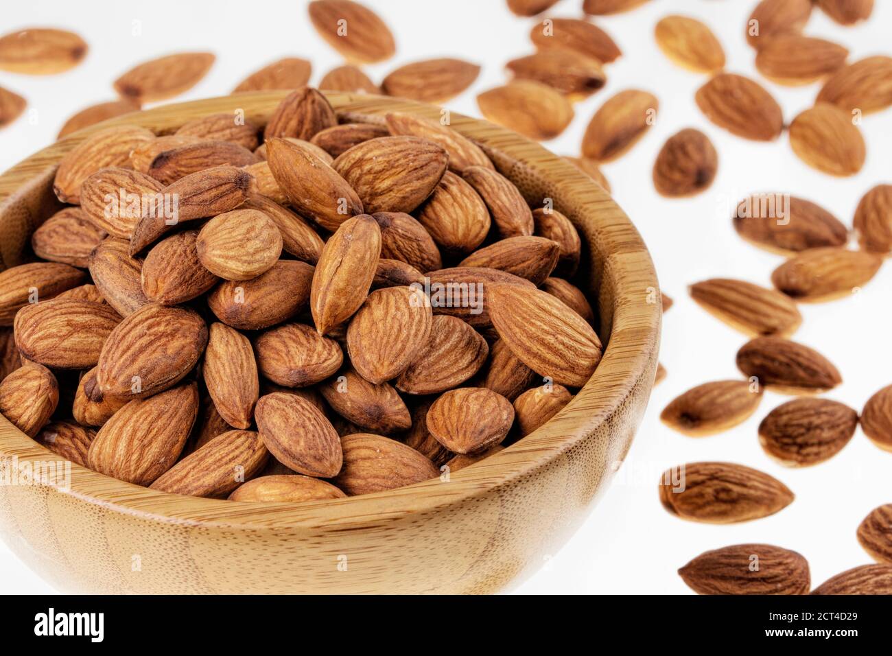 Almonds make a great comfort food and snack food isolated on a white ...