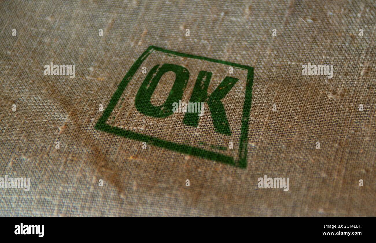 OK approved stamp printed on linen sack. Check, accepted, admitted and ...