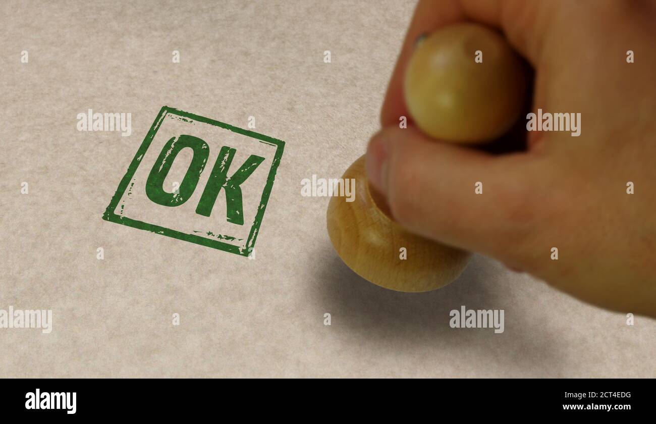 OK approved stamp and stamping hand. Check, accepted, admitted and ...