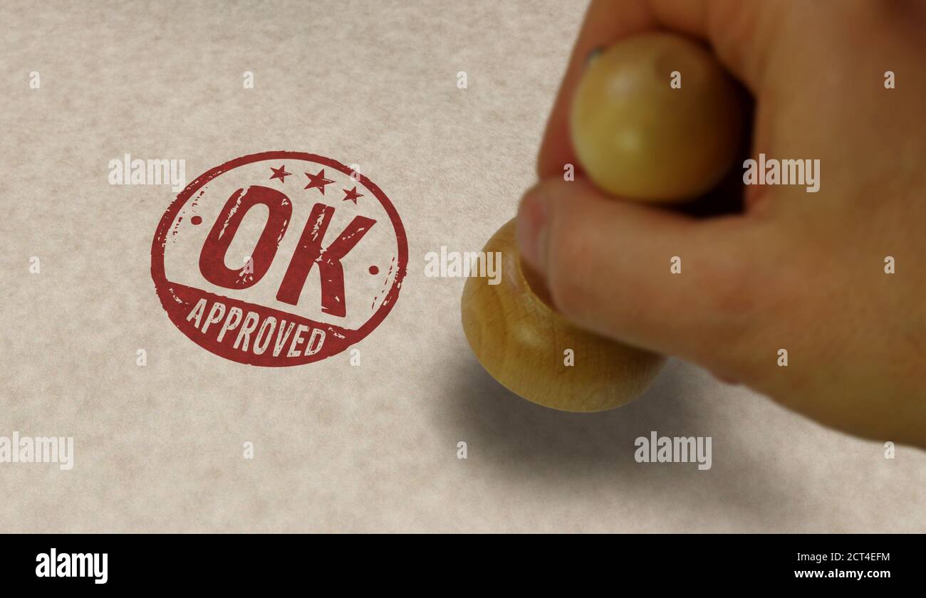 OK approved stamp and stamping hand. Check, accepted, admitted and ...