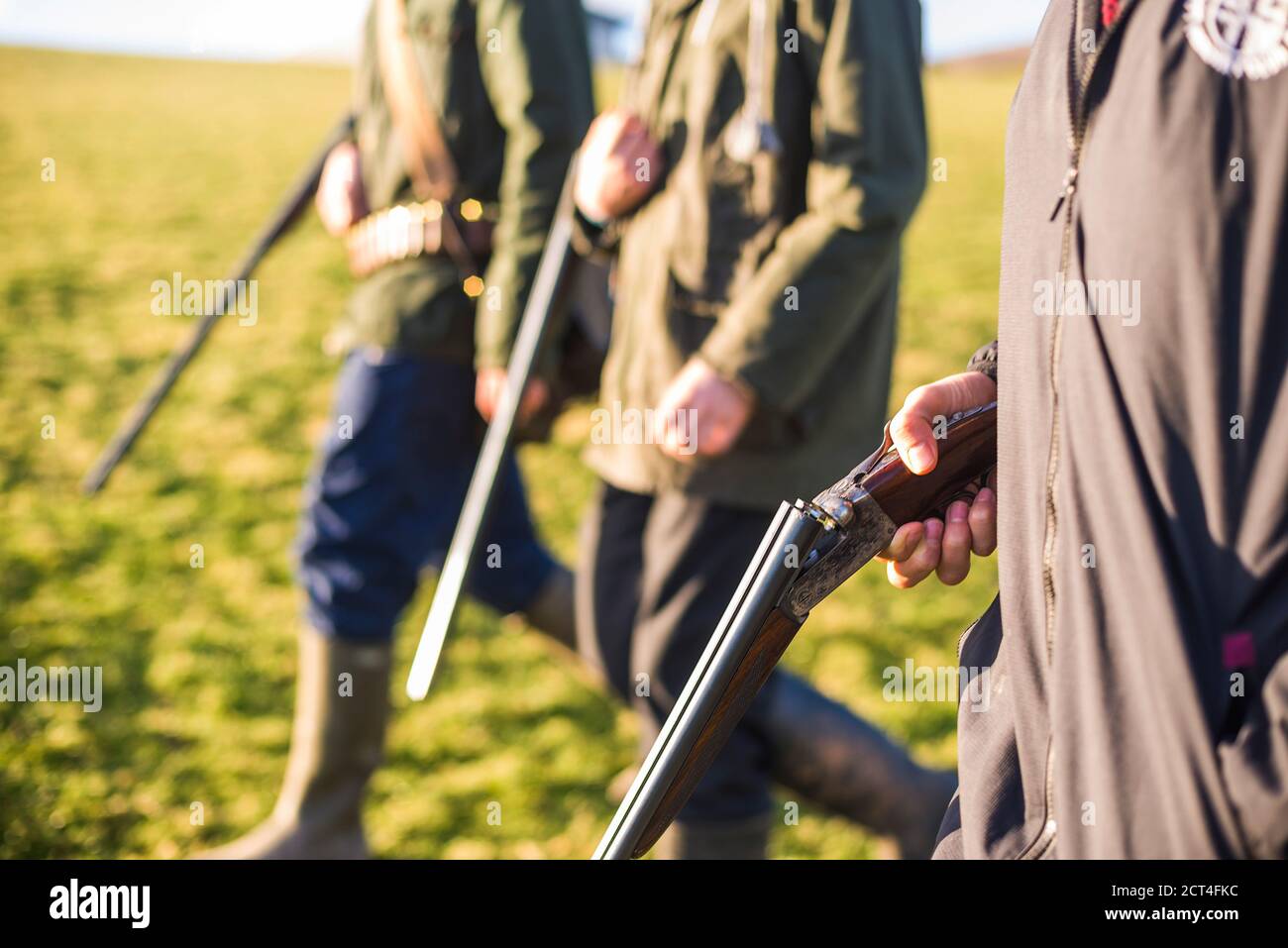 Men on a pheasant shooting trip in the rural countryside, game shooting ...
