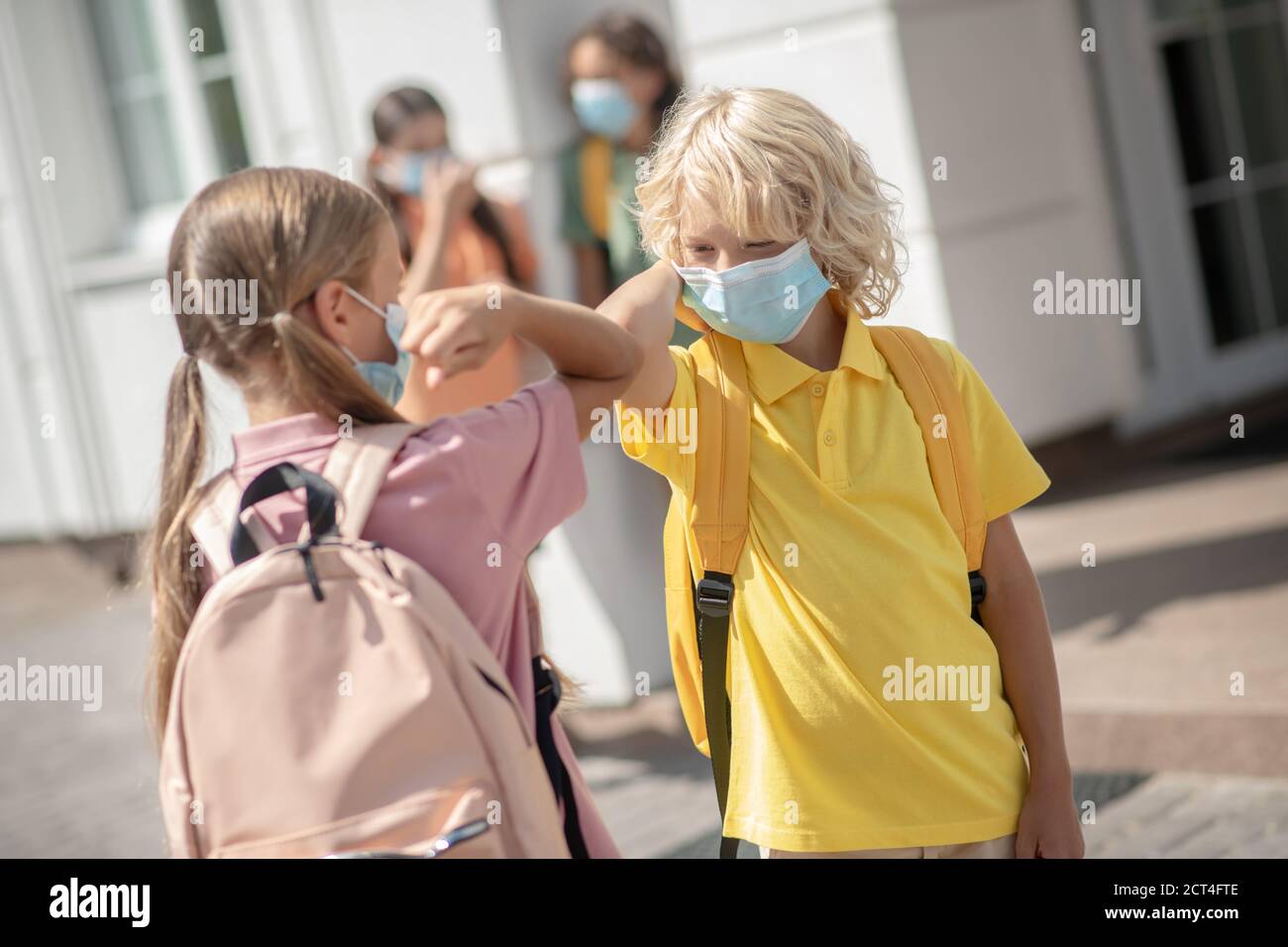 Children greeting each other hi-res stock photography and images - Alamy