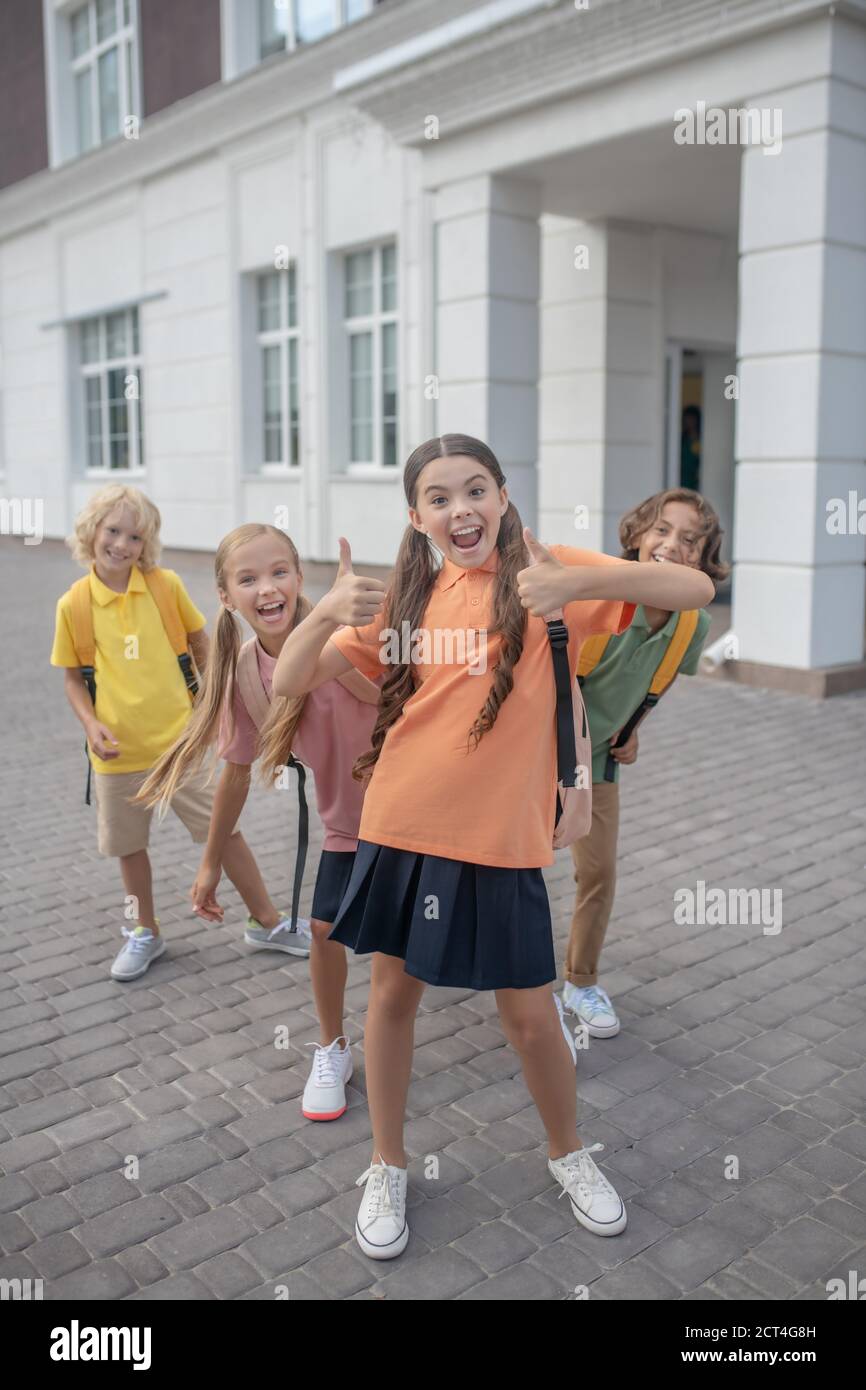 Schoolchildren playing in school yard and feeling joyful Stock Photo ...