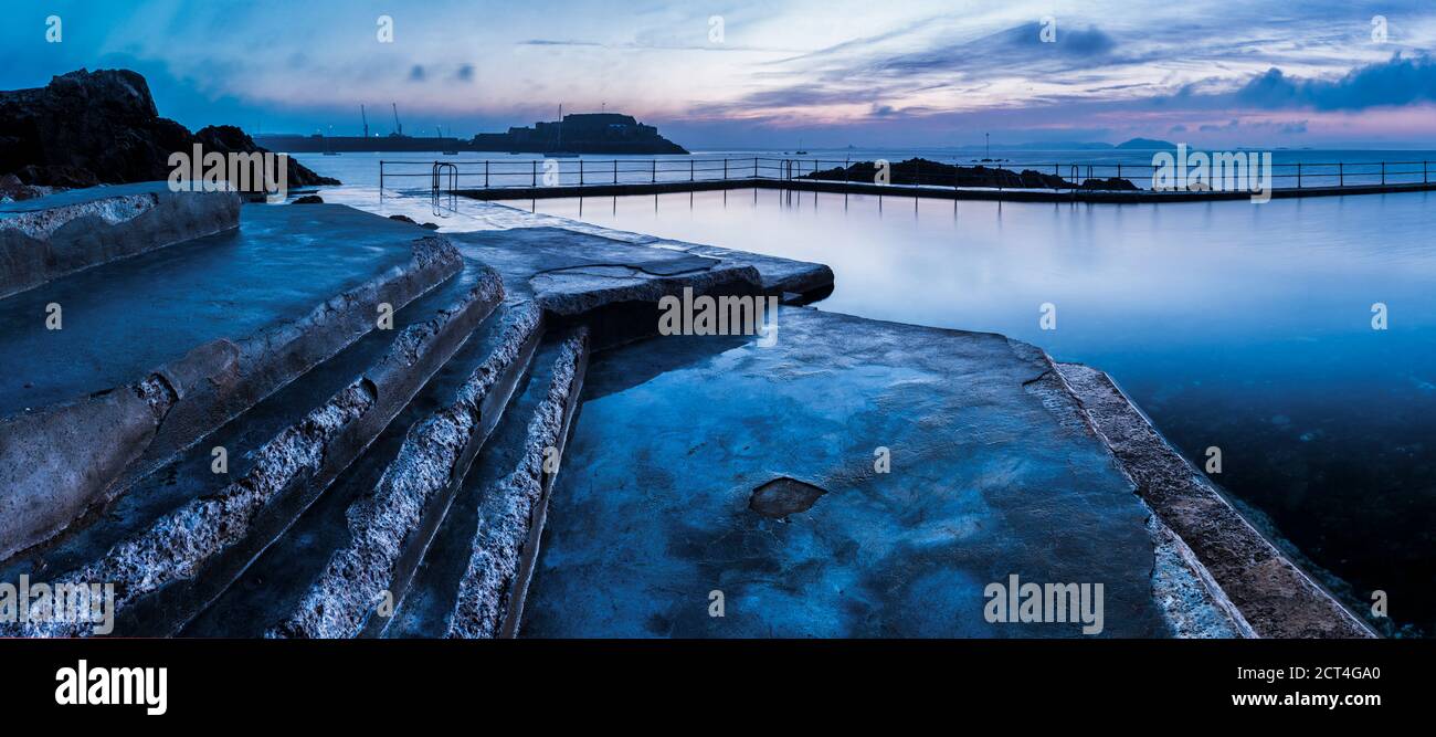 Guernsey Bathing Pools and Castle Cornet at sunrise, Channel Islands ...