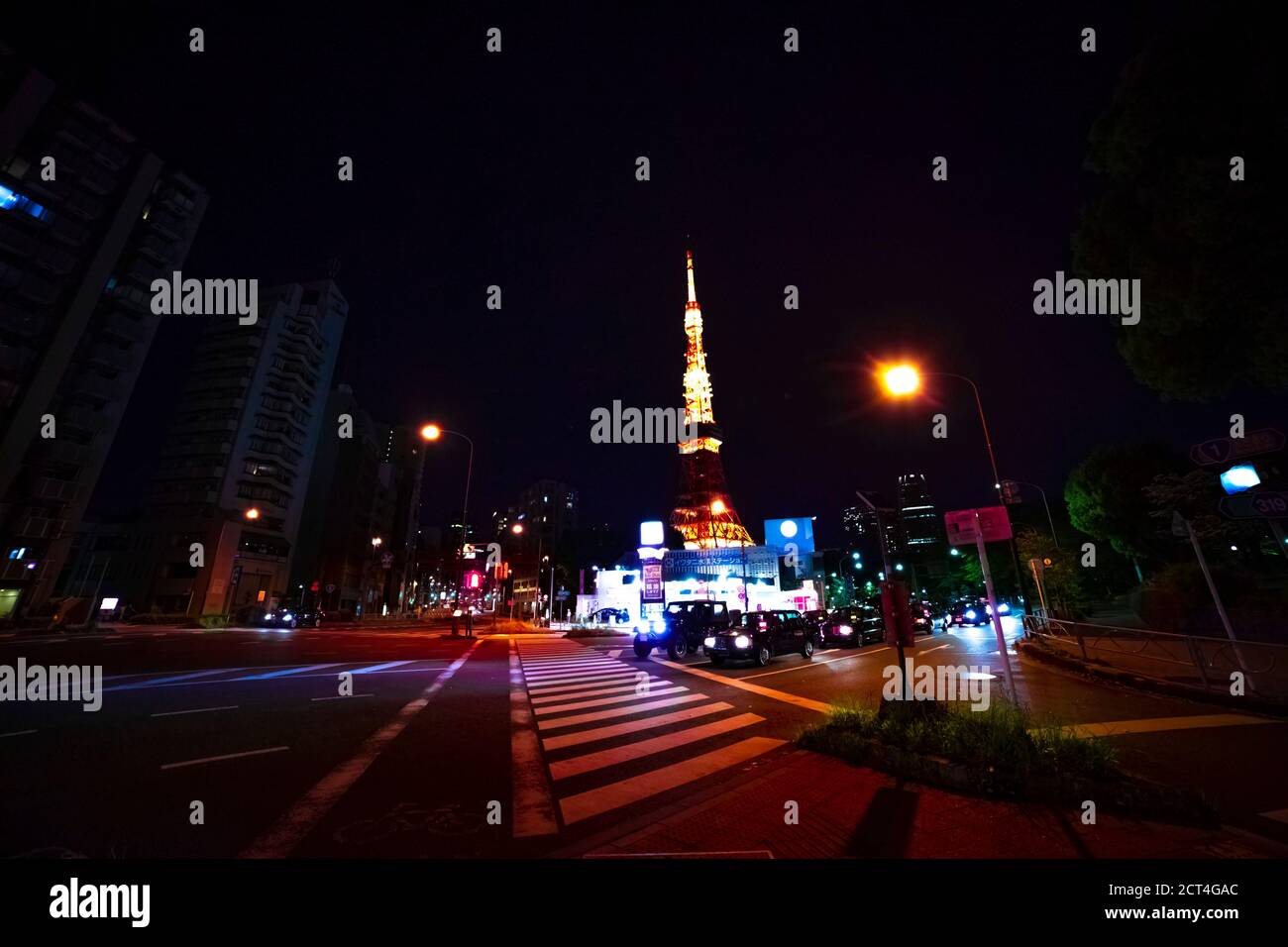 Night crossing behind the high tower in Tokyo Stock Photo - Alamy