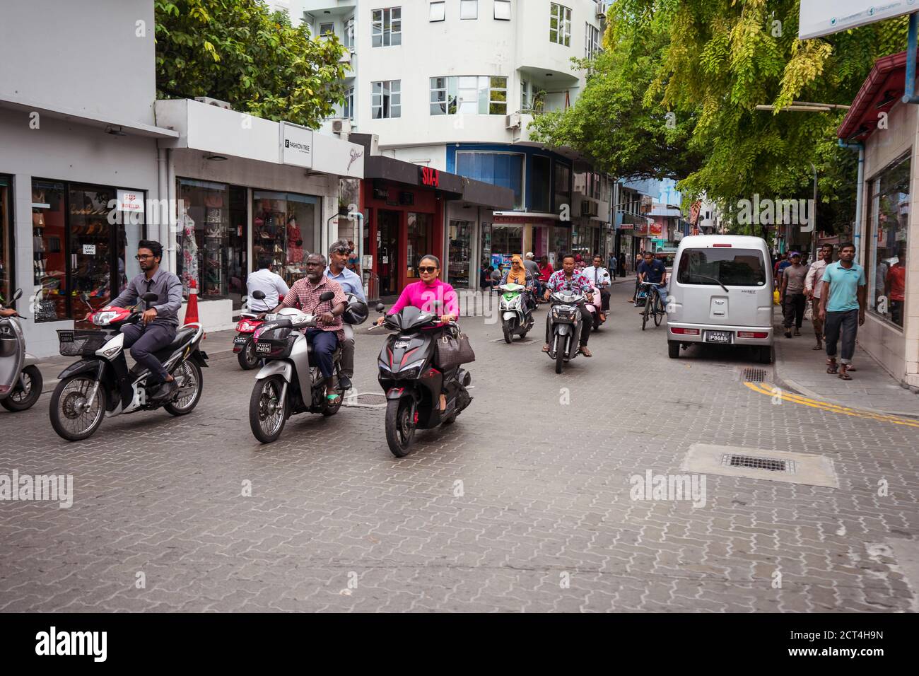 Male / Maldives - August 10, 2019: Muslim people riding motorcycles ...