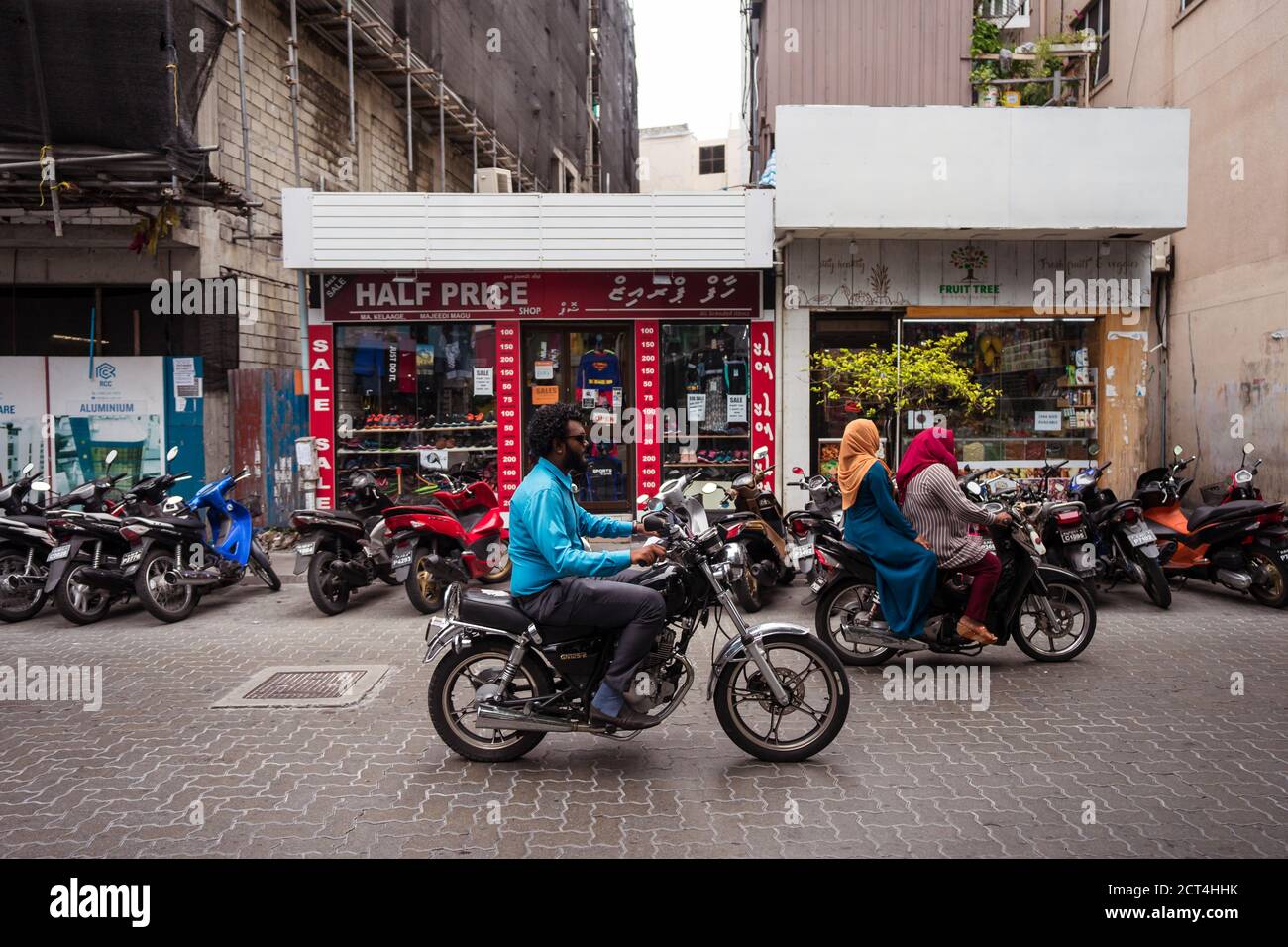 Male / Maldives - August 10, 2019: Muslim people riding motorcycles ...