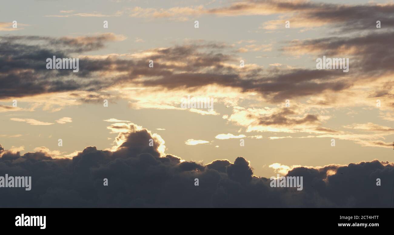 clouds slowly float in the sky during sunset, nature Stock Photo - Alamy