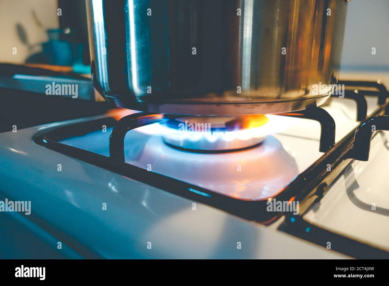 Cooking pan on gas stove close-up view Stock Photo - Alamy