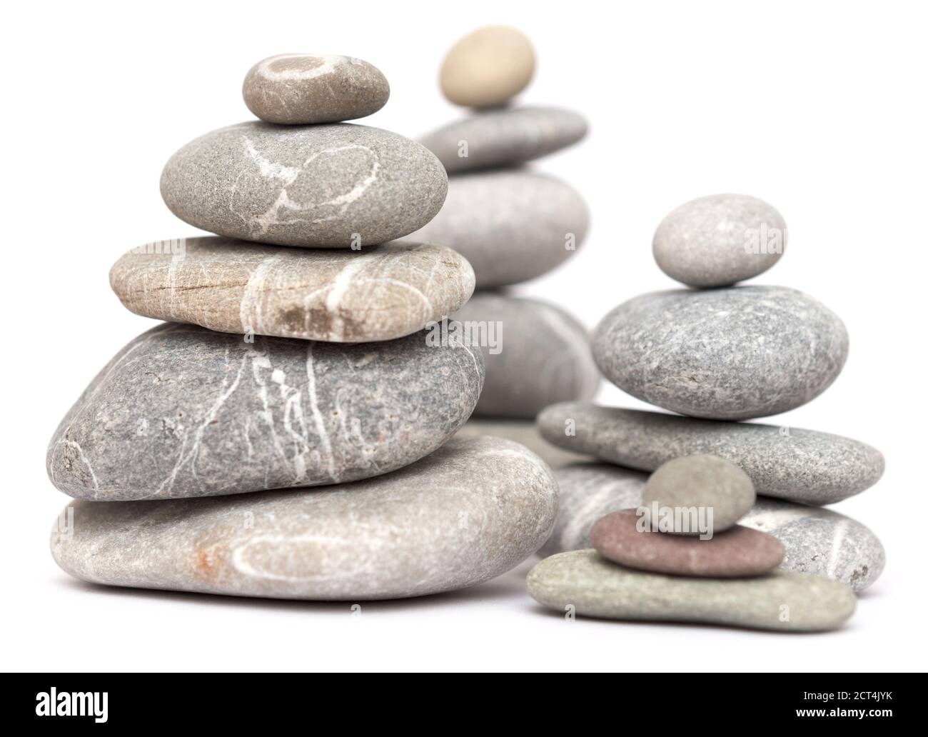 Balancing stones isolated on white background Stock Photo - Alamy