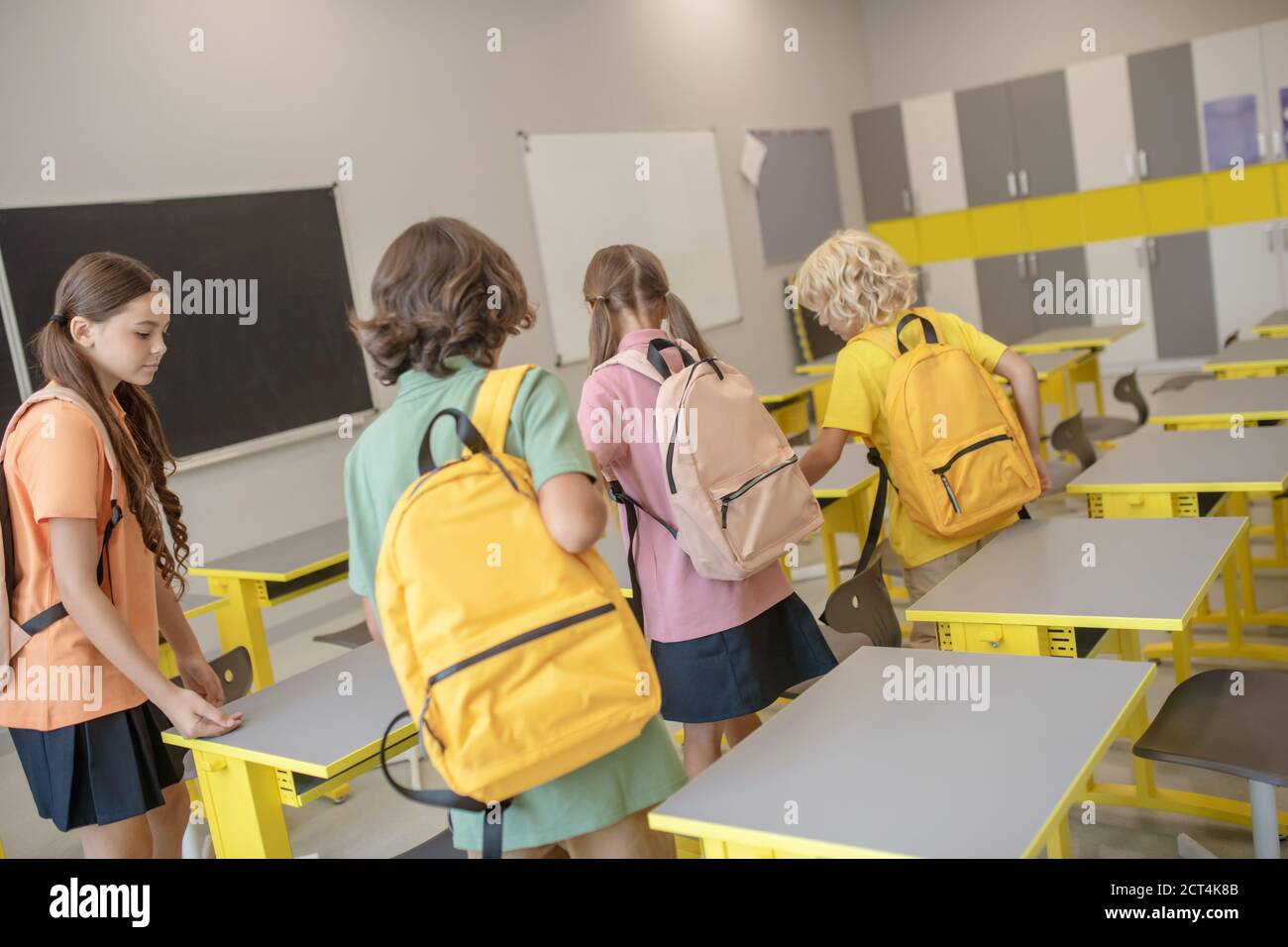 Kids entering school hi-res stock photography and images - Alamy